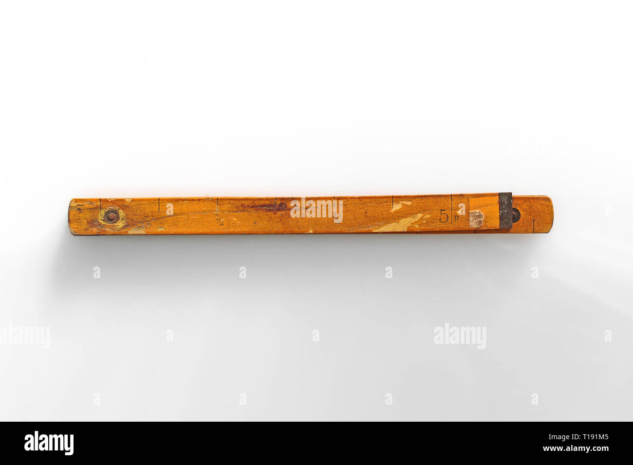 Antique wooden folding ruler isolated on a white background.isolated on ...