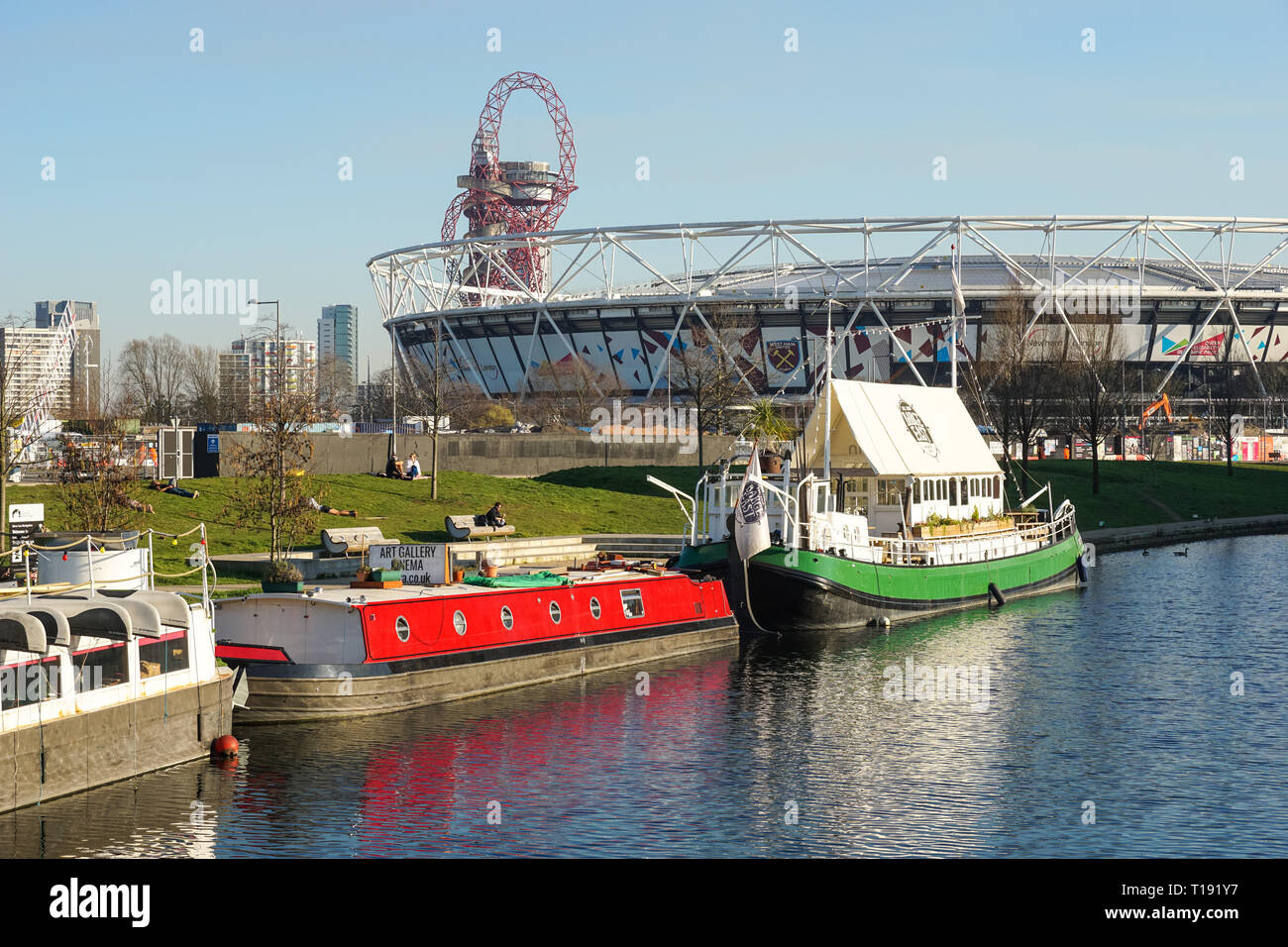 River Lee Navigation canal with West Ham London Stadium and ...