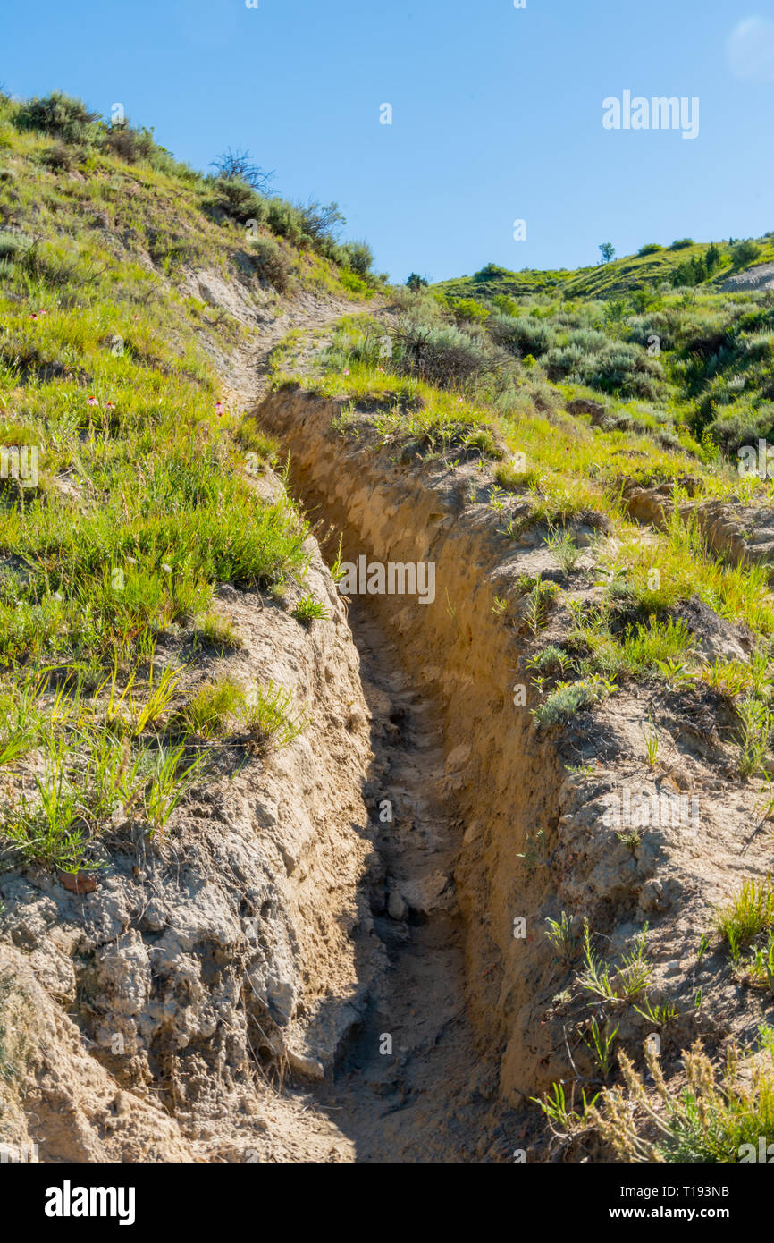 Deep Gouge Of Trail from erosion in prairie hiking trail Stock Photo ...
