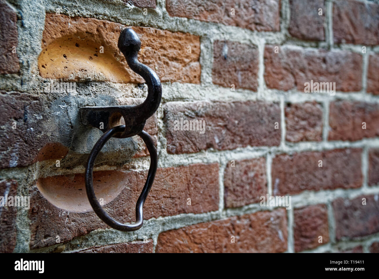 Blocker Tie Ring for horse, Ornate iron horse tie ring on the facade of ...