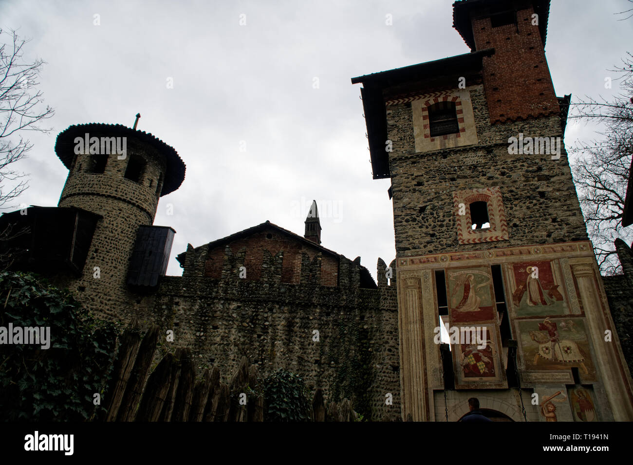 Towers of Medieval castle from red rocks or stones Stock Photo - Alamy