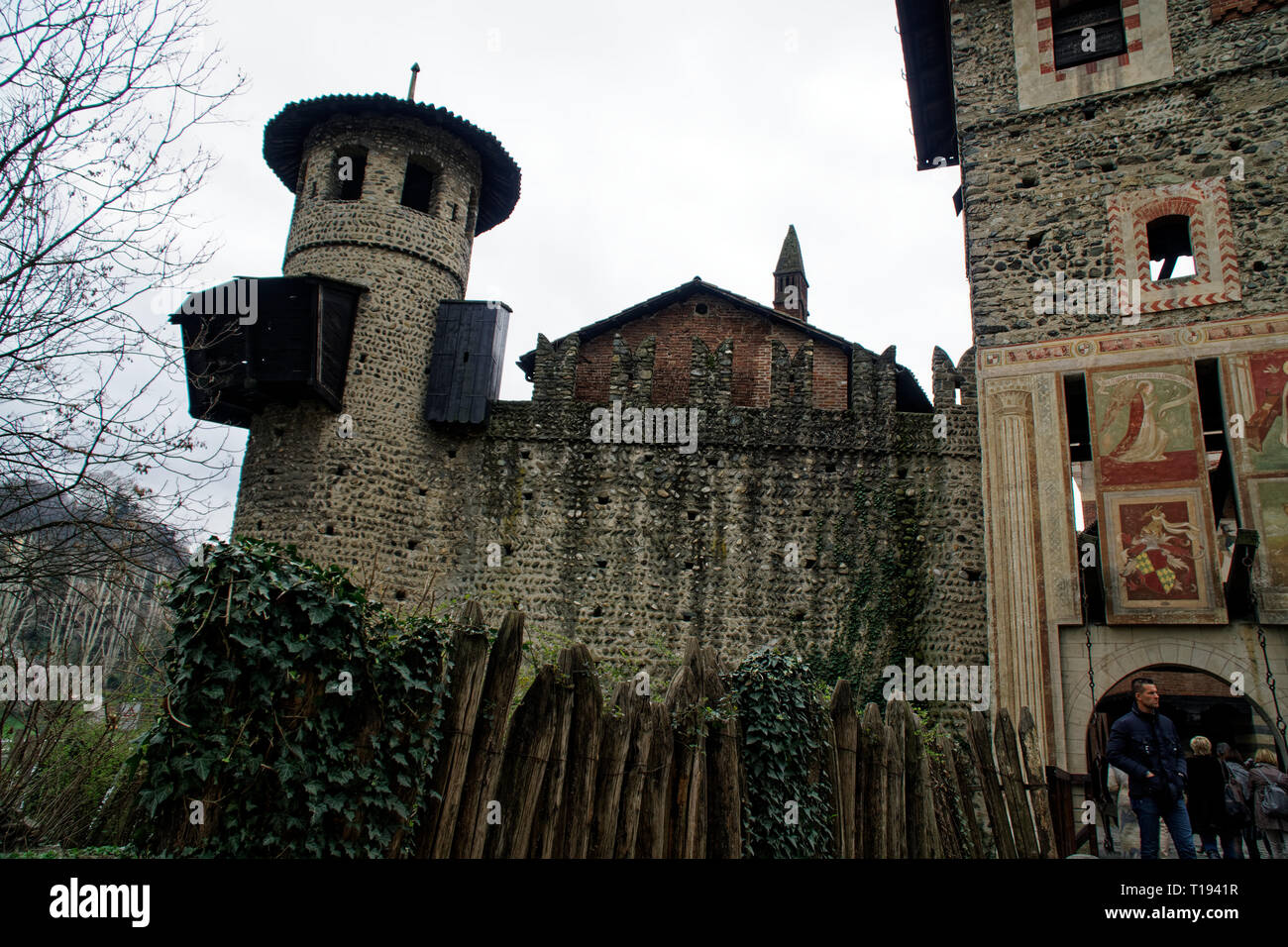 Towers of Medieval castle from red rocks or stones Stock Photo - Alamy