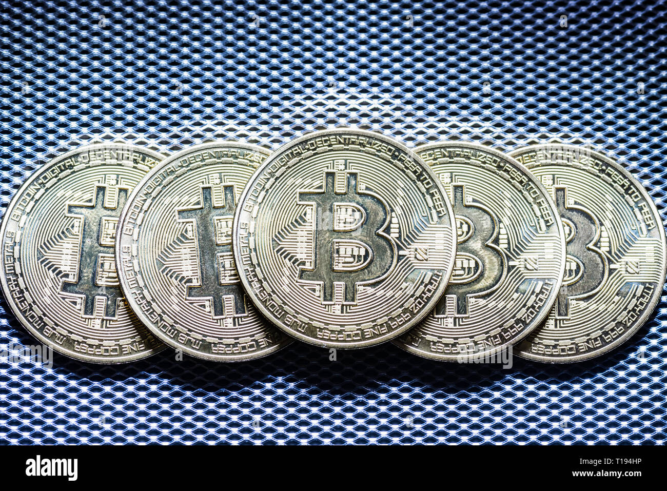 Top view of golden bit coins painted with light.Bitcoin digital ...