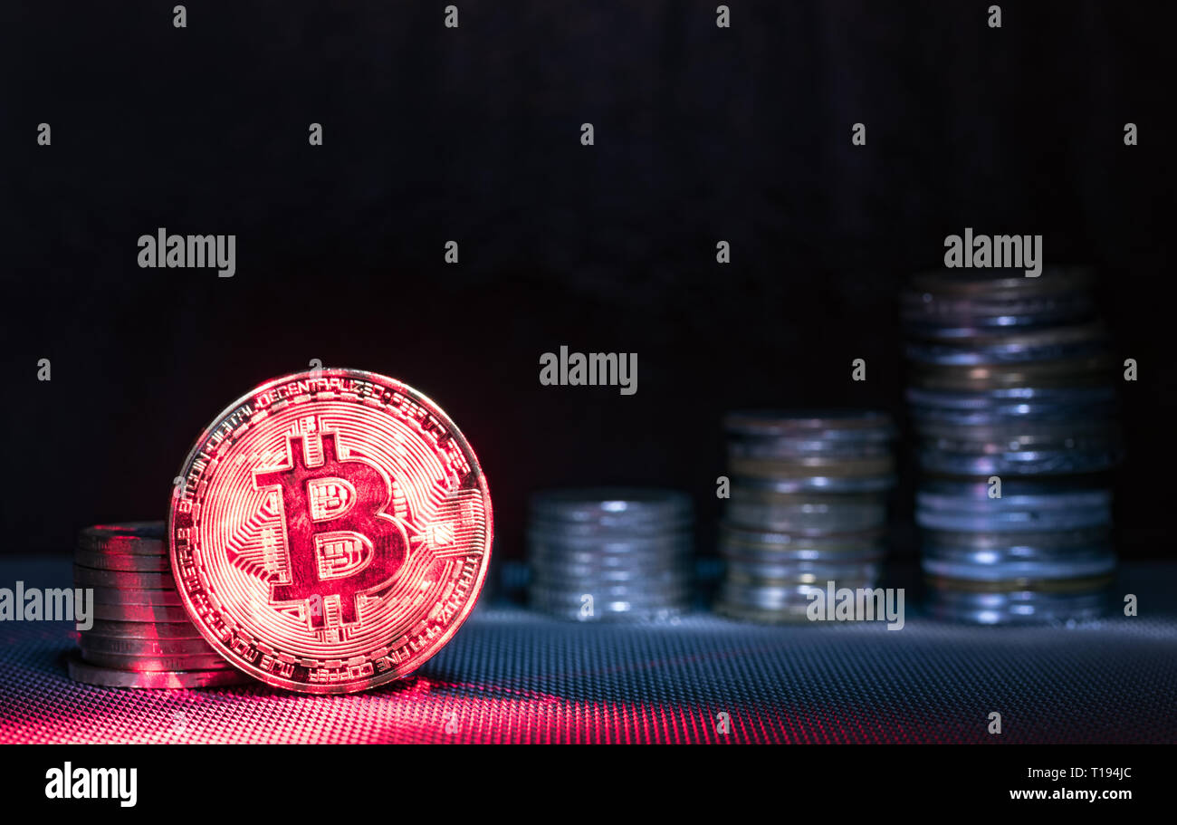 Front view of single golden bit coin painted with laser light.Bitcoin ...