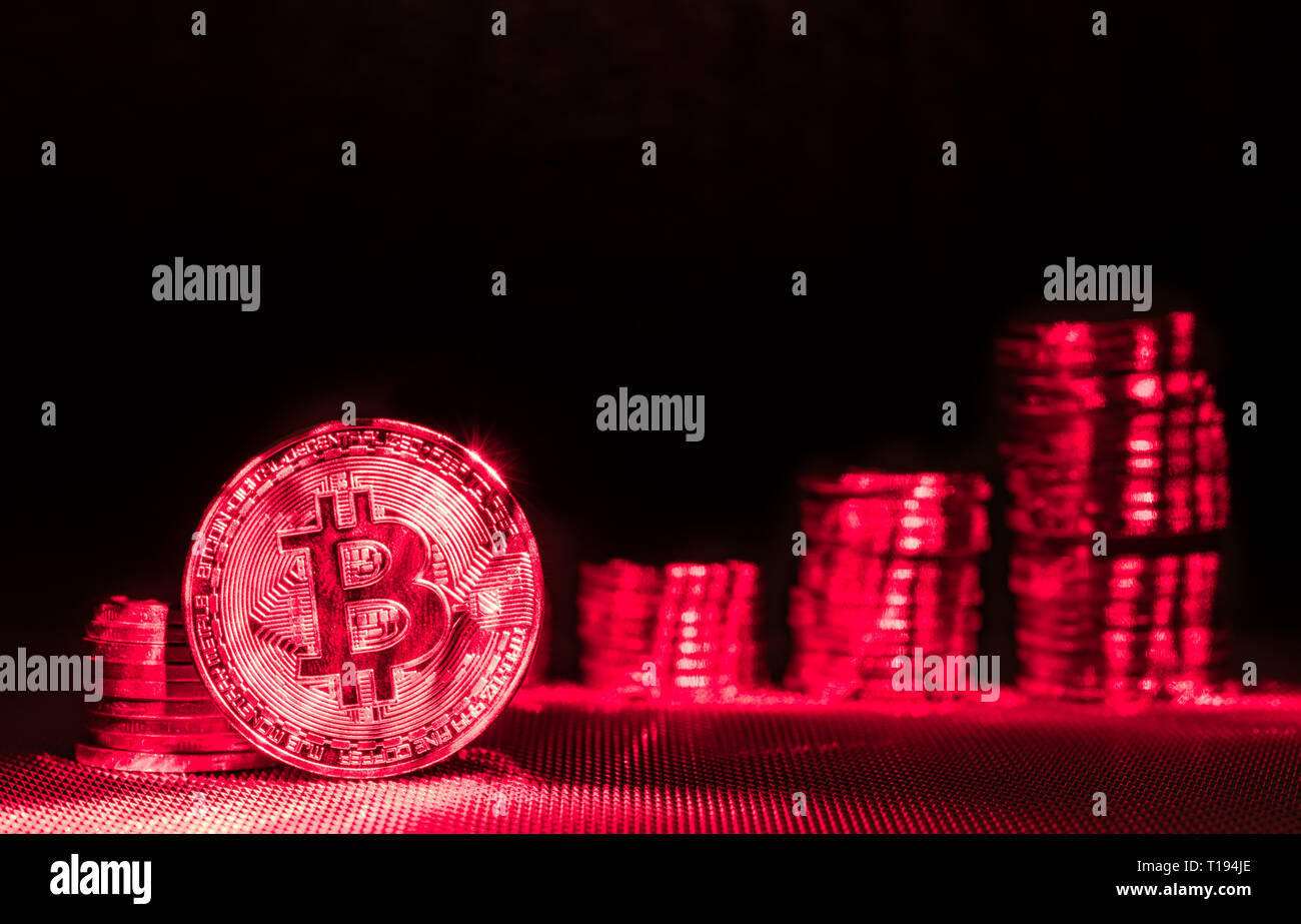Front view of single golden bit coin painted with laser light.Bitcoin ...