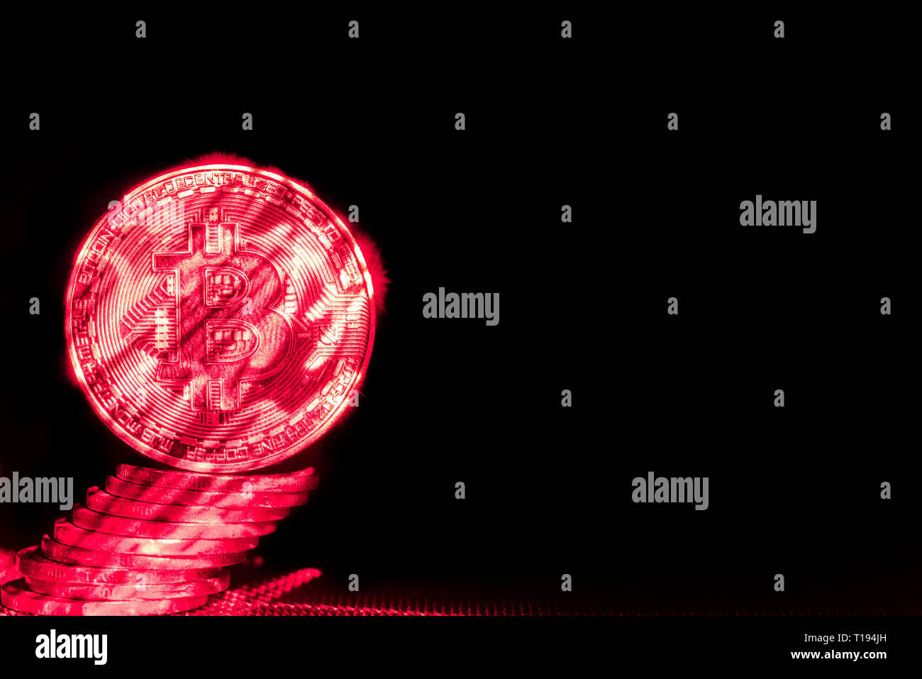 Front view of single golden bit coin painted with laser light.Bitcoin ...