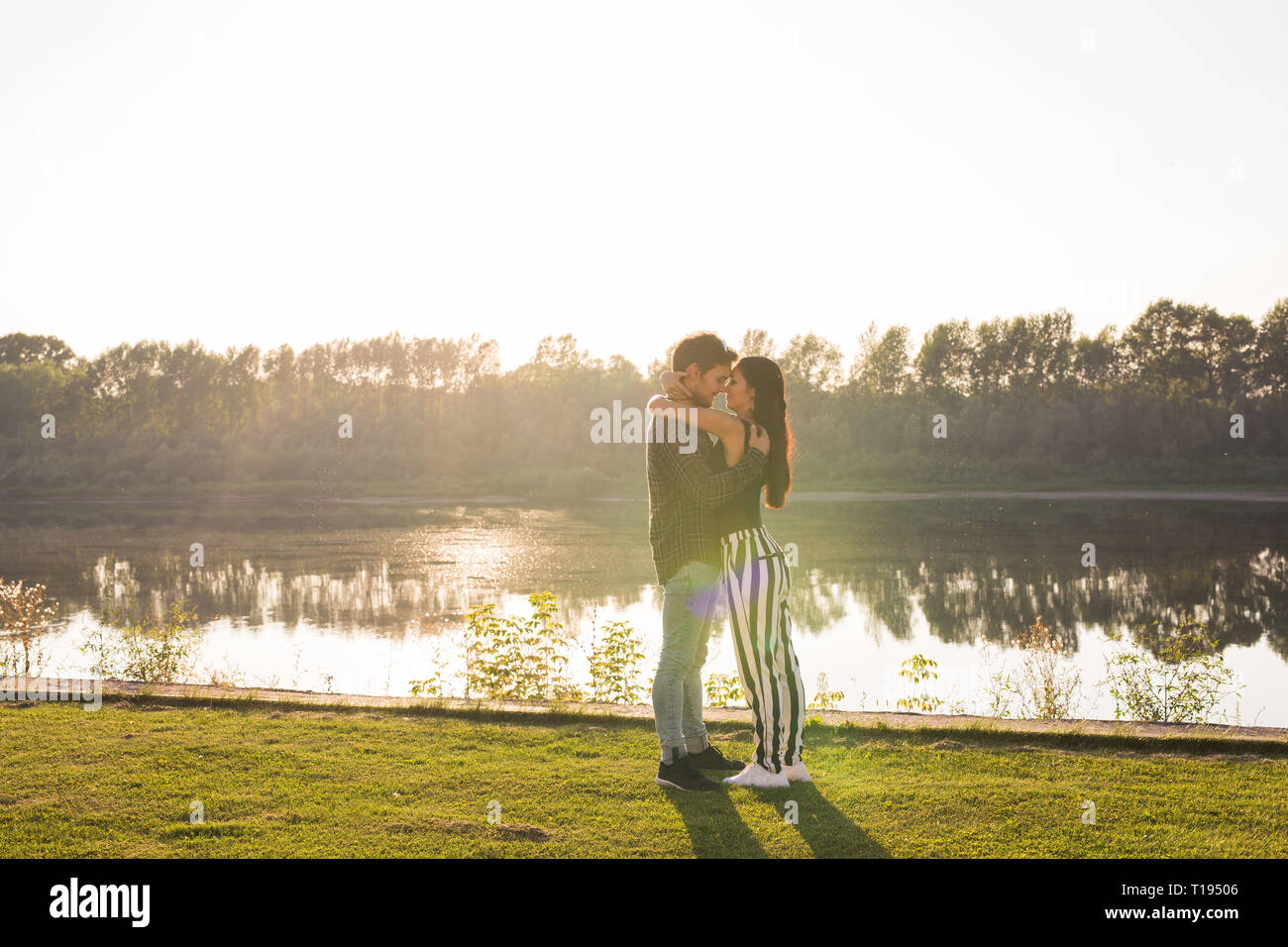 Tenderness, love and nature concept - Beautiful woman and handsome man ...