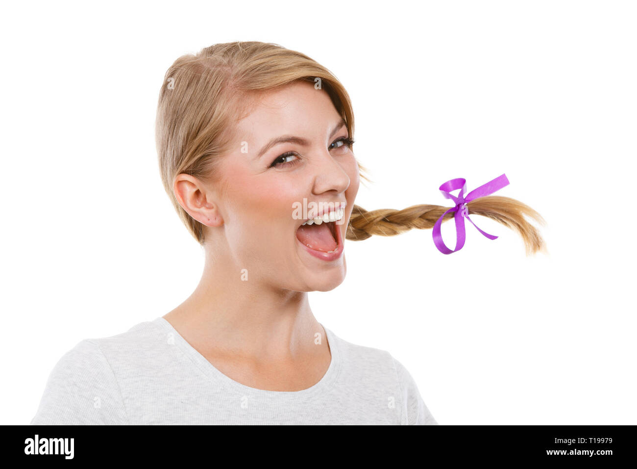Face expression, happiness concept. Teenage girl in blonde braid ...