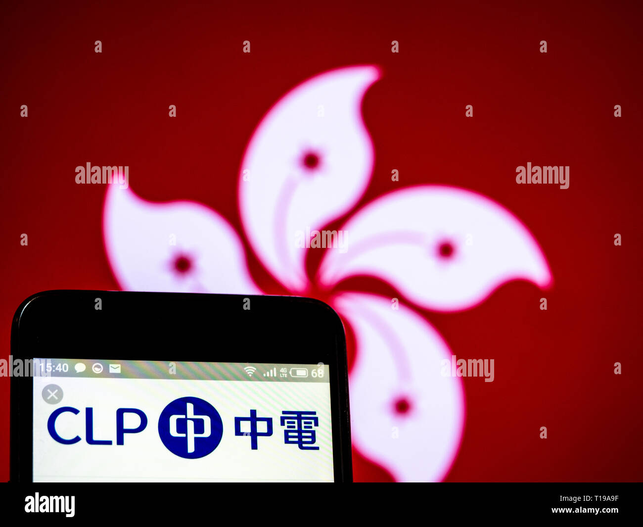 In this photo illustration a CLP Group logo seen displayed on a smart ...