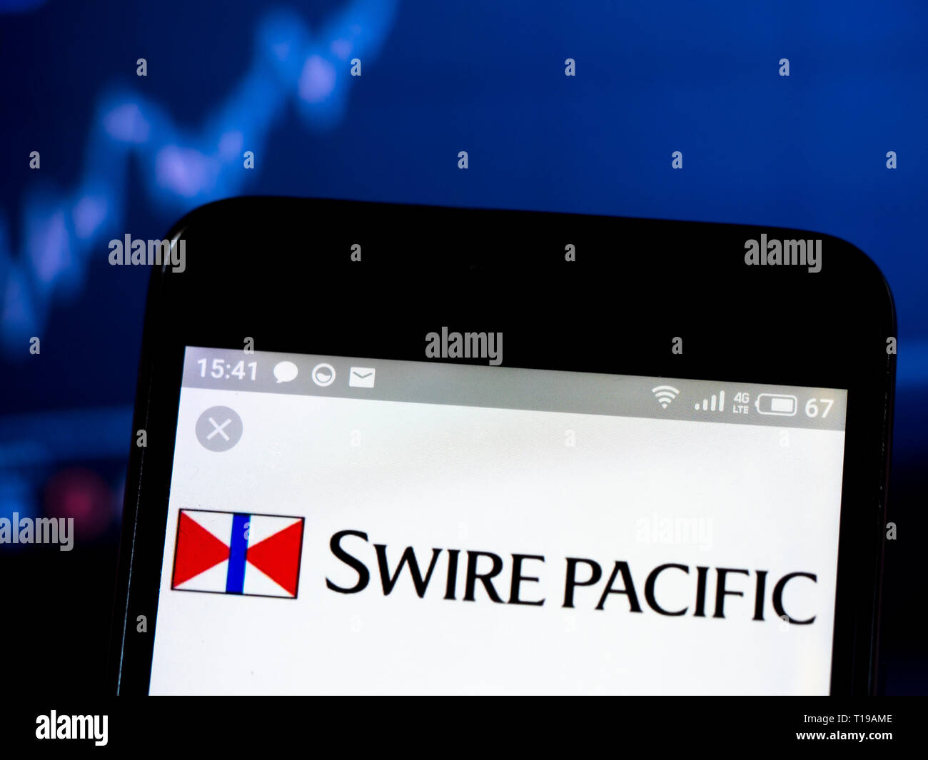 In this photo illustration a Swire Group logo seen displayed on a smart ...
