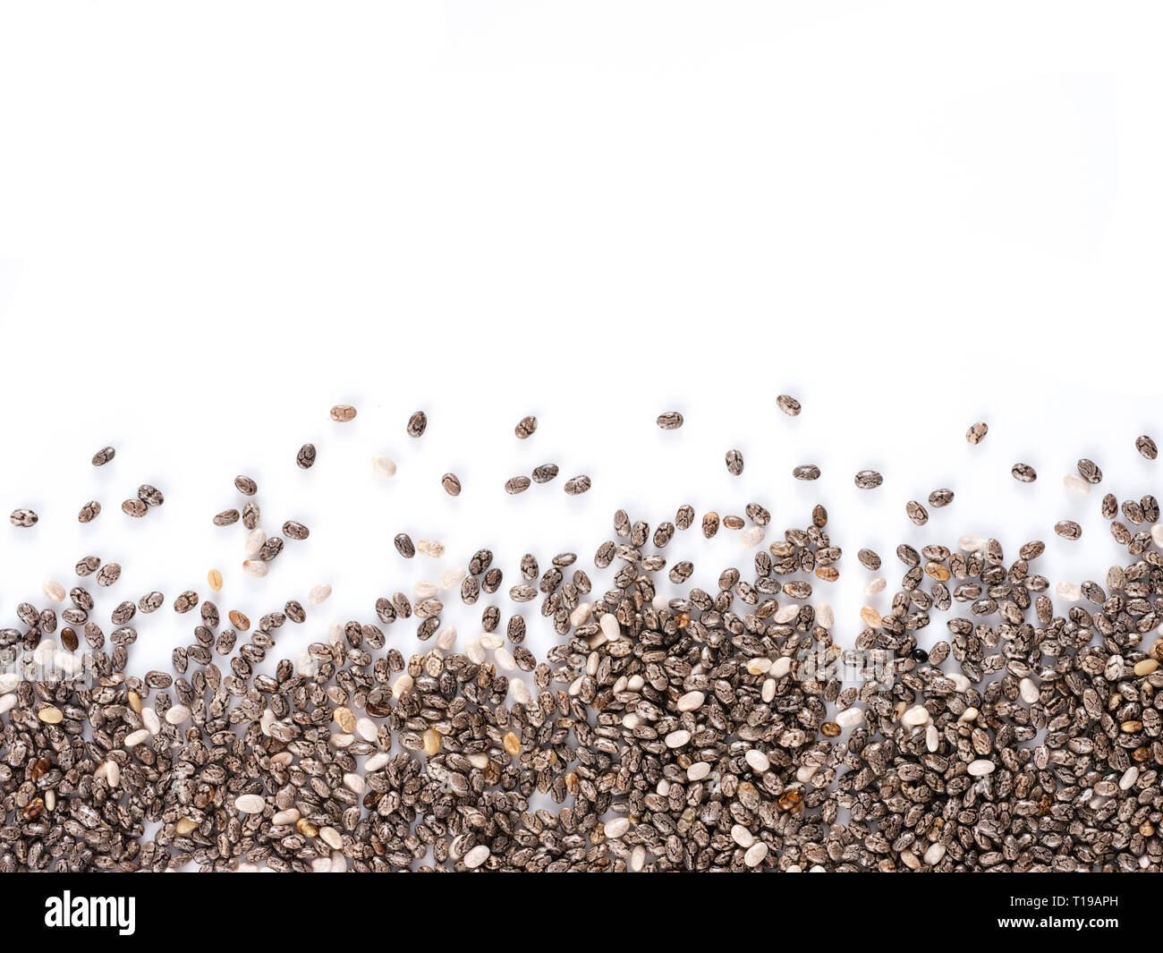 Chia seeds with copy space. Isolated one edge. Top view or flat lay ...