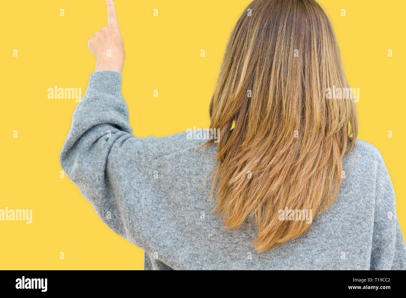 Beautiful middle age woman wearing winter sweater over isolated ...