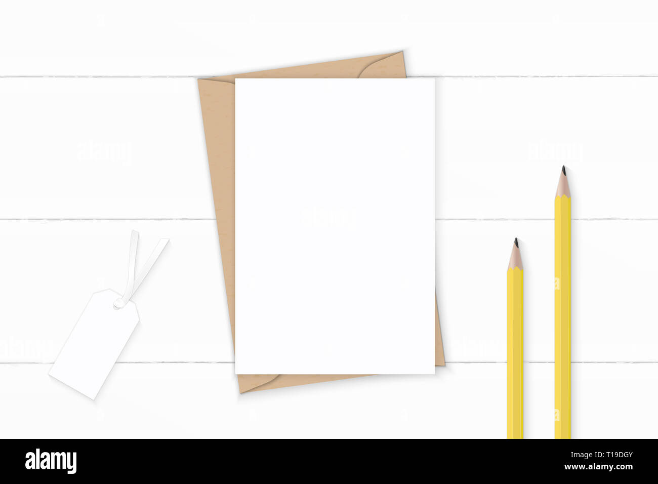 Flat lay top view elegant white composition letter kraft paper envelope ...