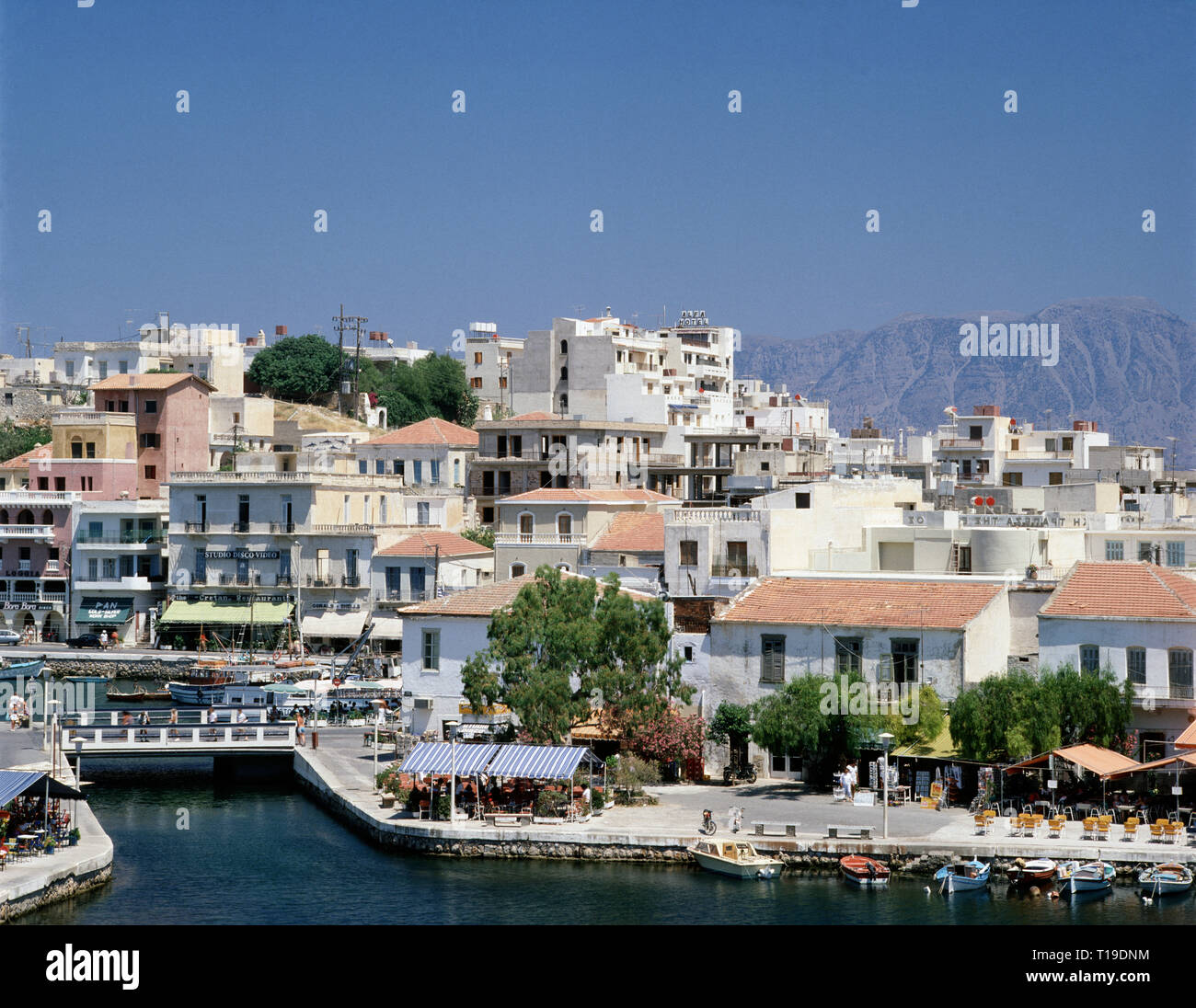Greece. Crete. Agios Nikolaos. View of town and harbour Stock Photo - Alamy