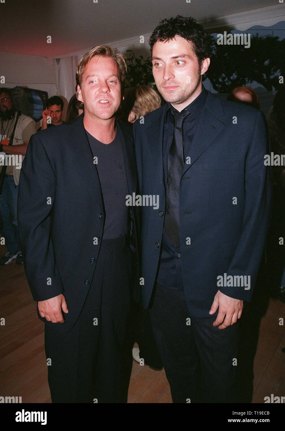CANNES, FRANCE - May 17, 1998: Actors KEIFER SUTHERLAND (left) & RUFUS ...