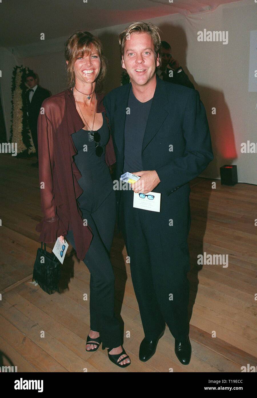CANNES, FRANCE - May 17, 1998: Actor KEIFER SUTHERLAND & wife KELLY ...