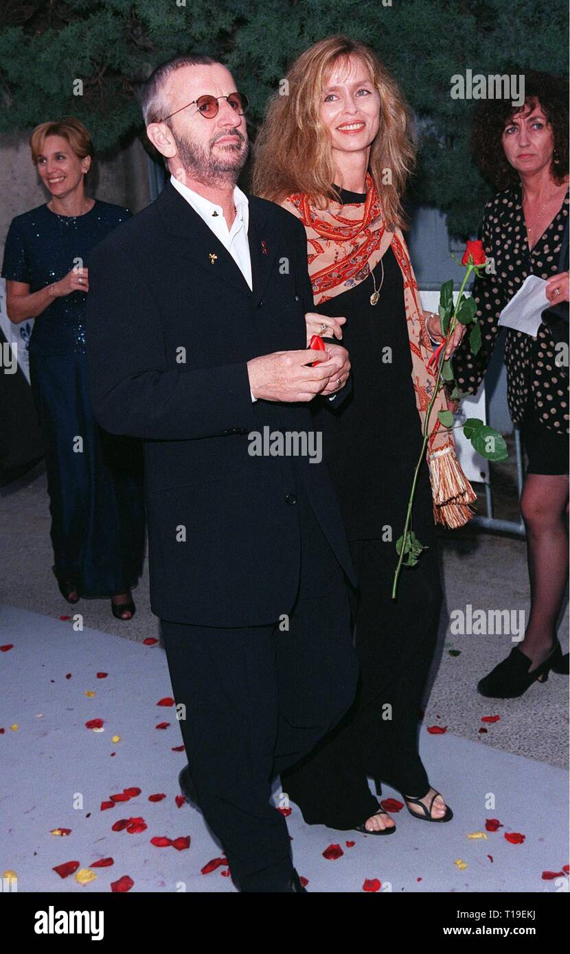 CANNES, FRANCE - May 21, 1998: Former Beatle RINGO STARR & actress wife ...