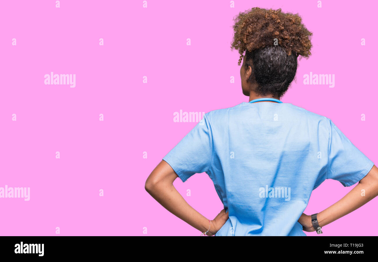 Young african american doctor woman over isolated background standing ...
