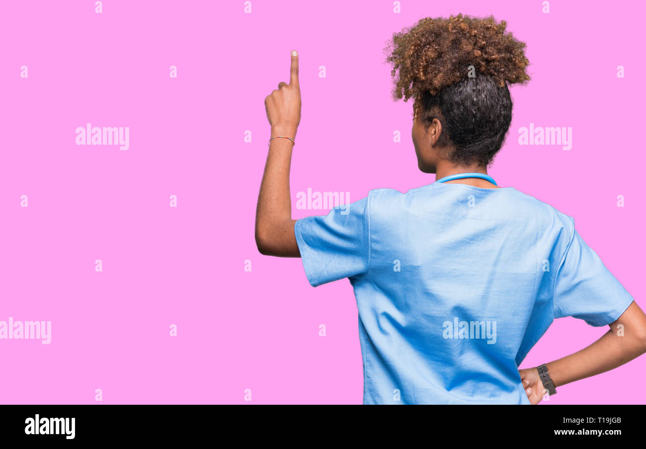Young african american doctor woman over isolated background Posing ...