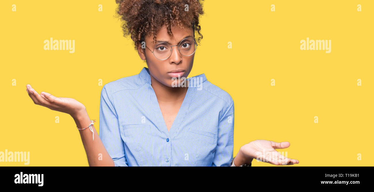 Beautiful young african american business woman over isolated ...