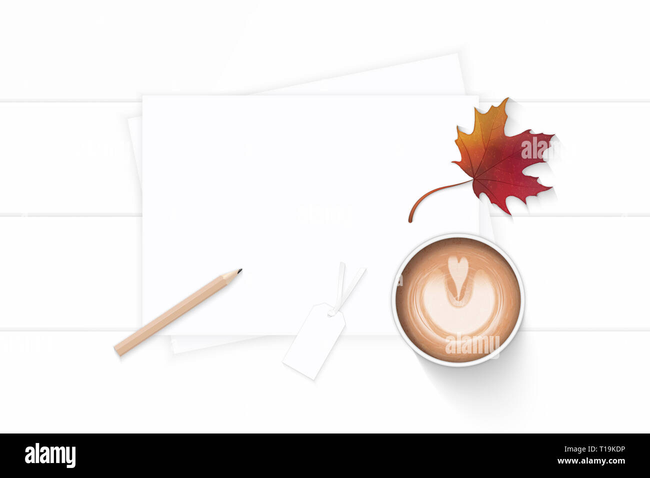 Flat lay top view elegant white composition paper coffee tag pencil and ...