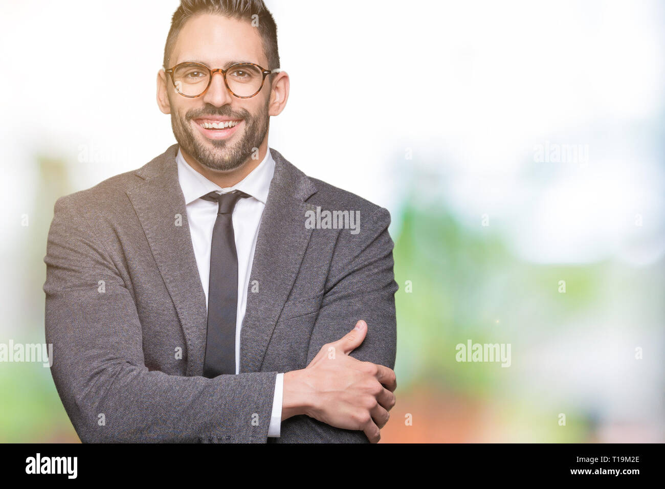 Young handsome business man over isolated background happy face smiling ...