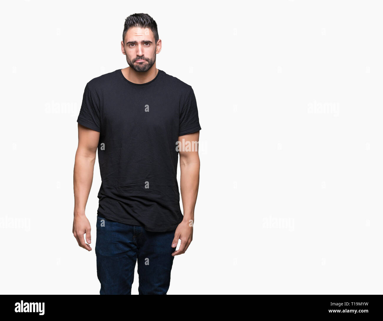 Young handsome man over isolated background depressed and worry for ...