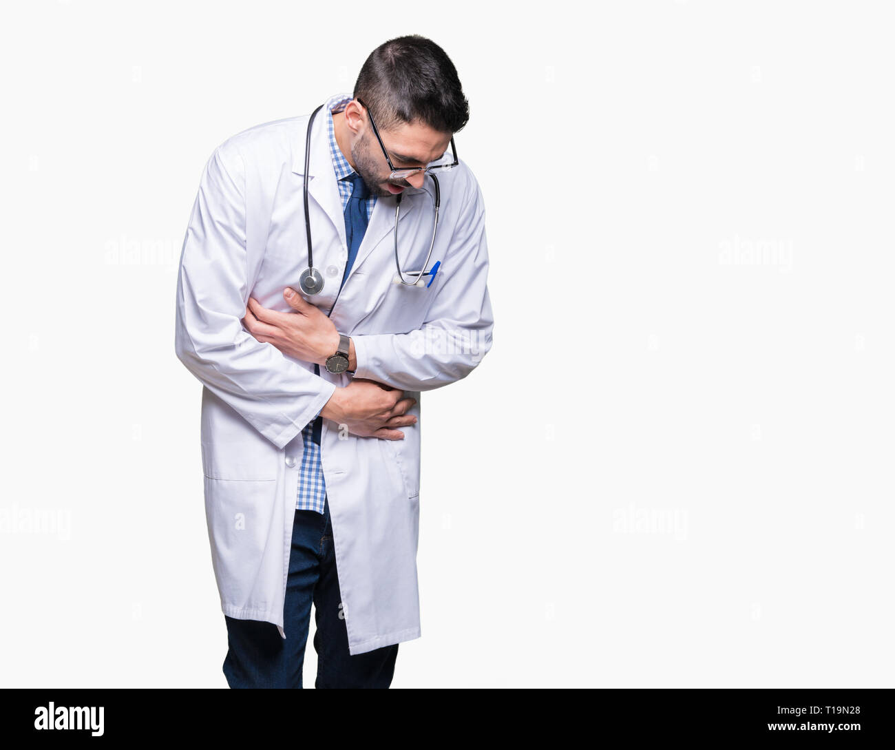 Handsome young doctor man over isolated background with hand on stomach ...