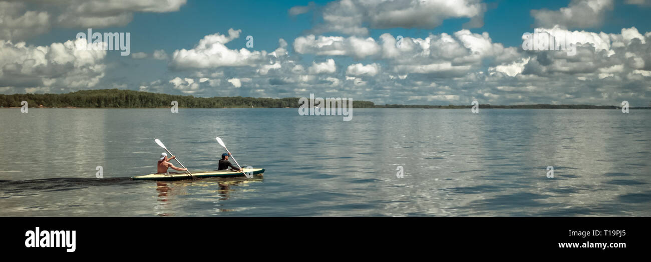2017-06-12 Samara, Russia. Two rowers in a canoe kayak boat floating on ...