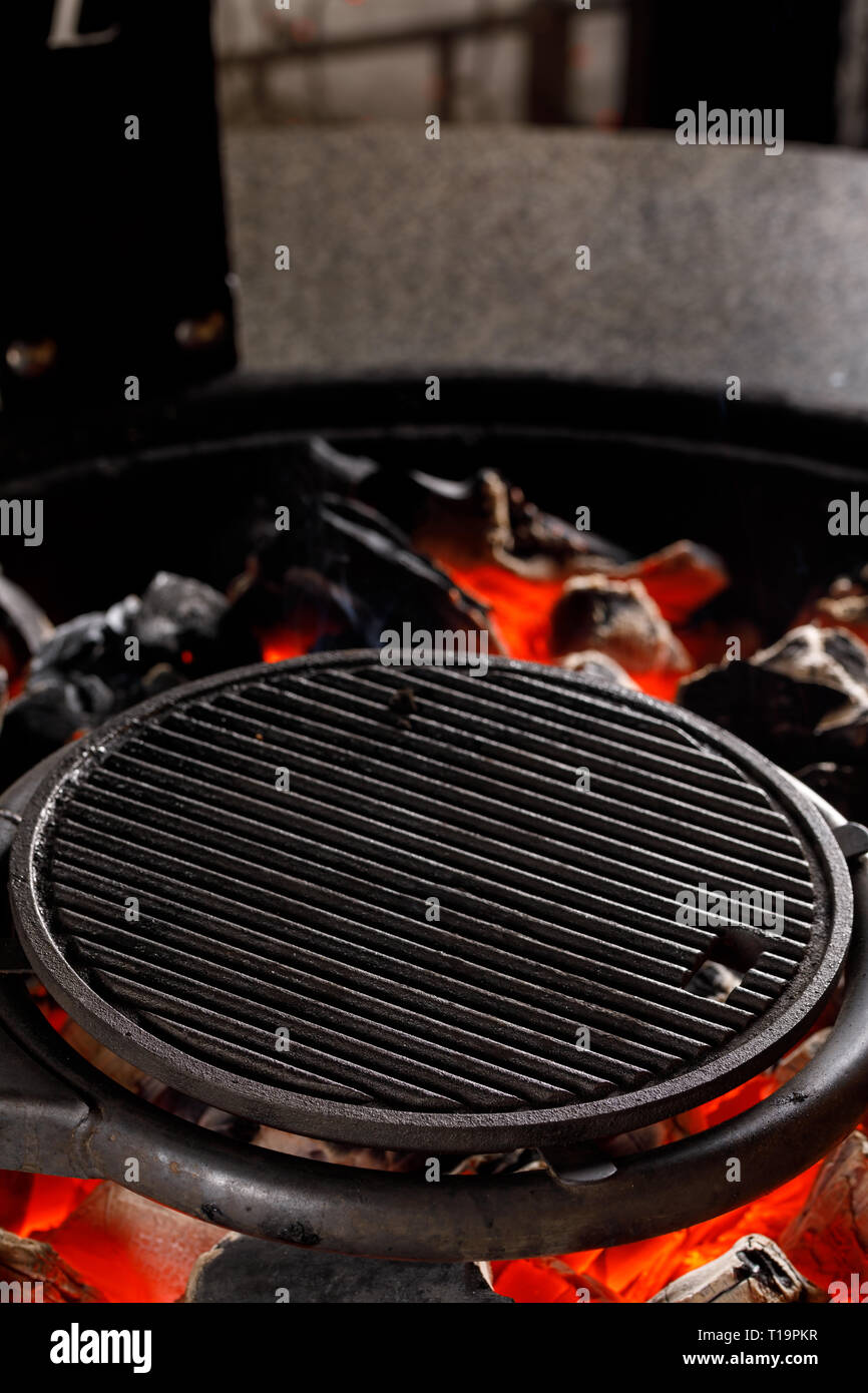 Hot empty charcoal BBQ grill with bright flames on Cookout. Concept ...