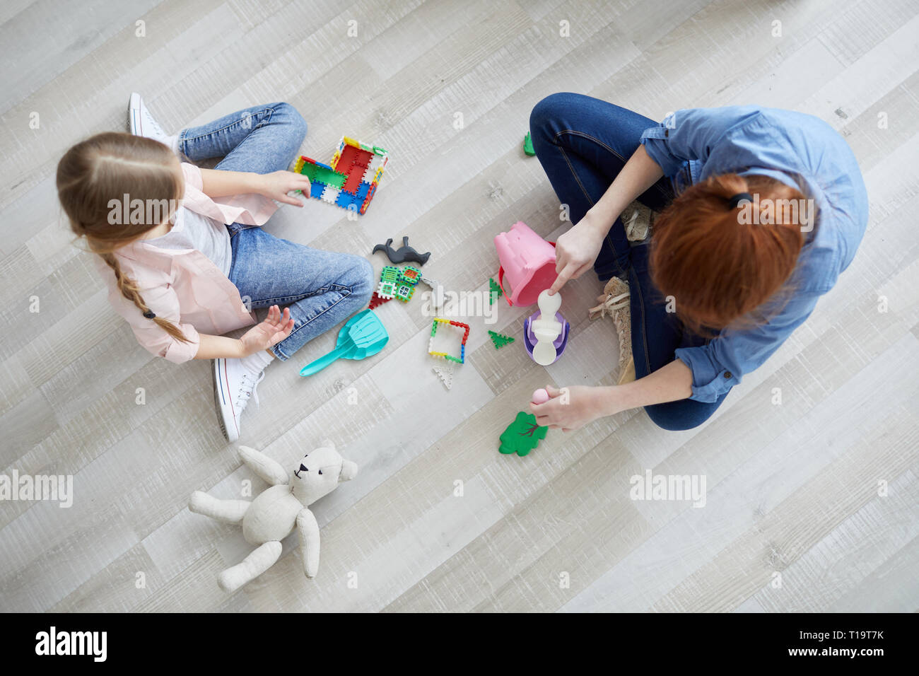 Two Girls Playing Top View Stock Photo - Alamy