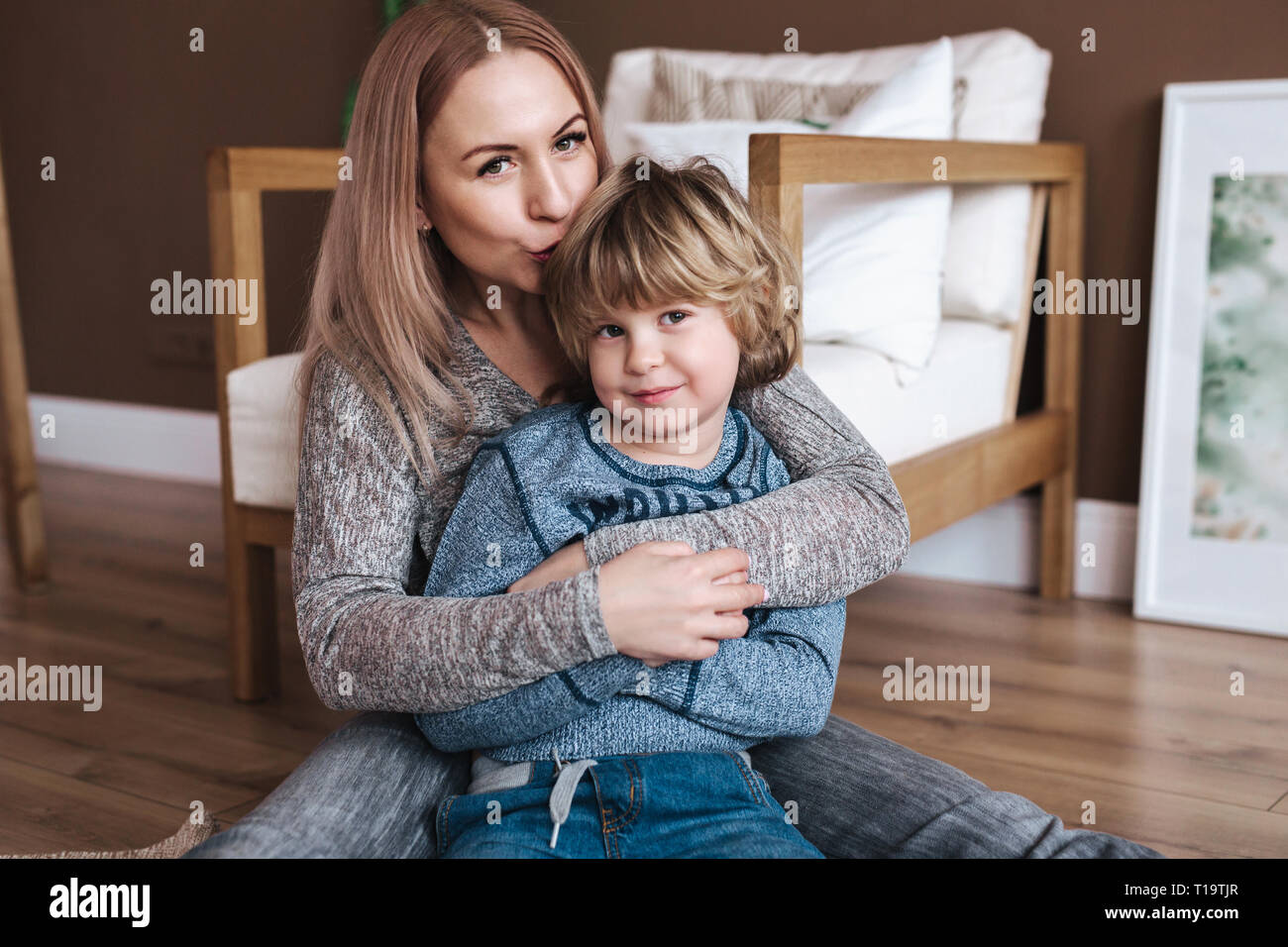 Mother is kissing his son. Mom and son. Happy mother's day. Mother ...
