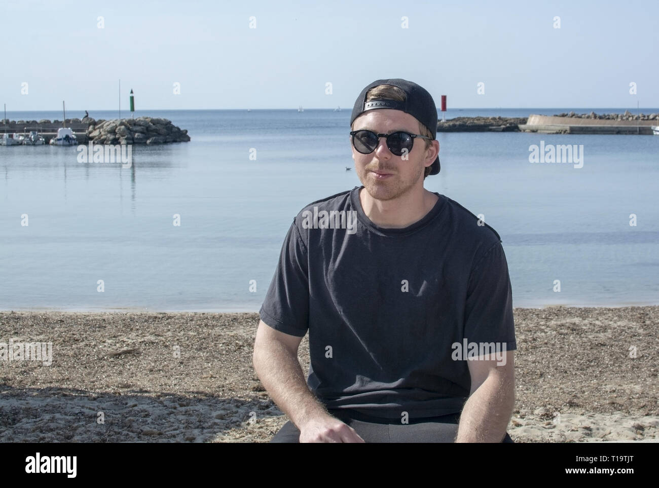 Backwards cap hi-res stock photography and images - Alamy