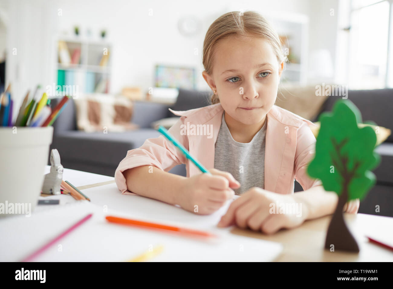 Little Girl doing Homework Stock Photo - Alamy