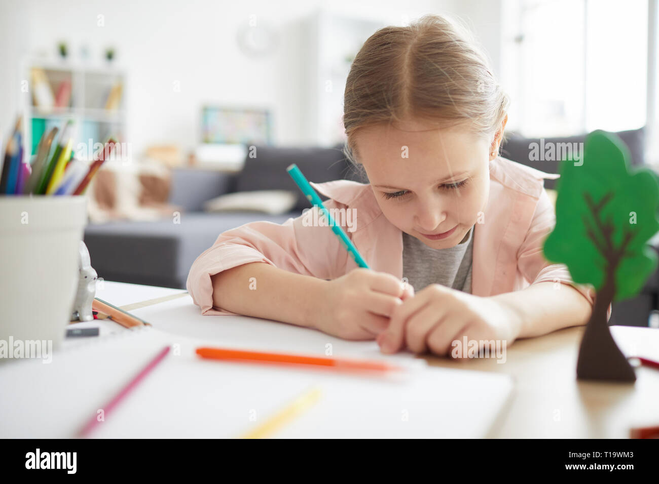 Cute little Girl Studying Stock Photo - Alamy