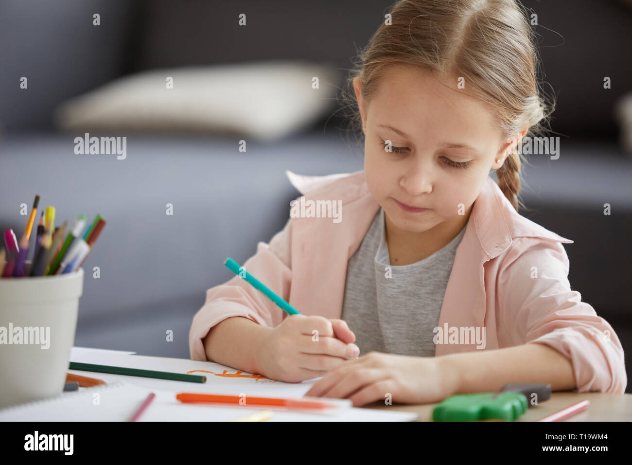 Diligent Little Girl Studying Stock Photo - Alamy