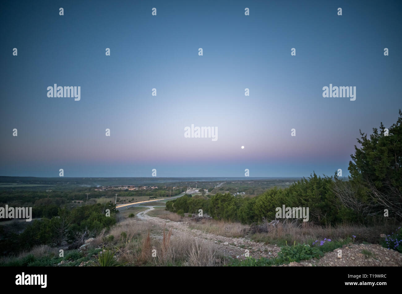 Wide Angle View of Full Moon Over Hill Country Valley During Early ...