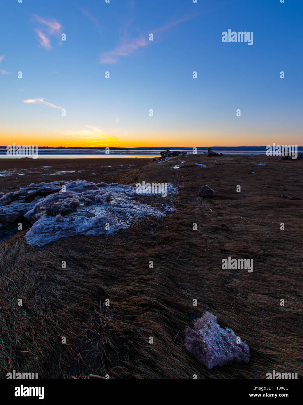 giant ice chunks on beach at sunset Stock Photo - Alamy