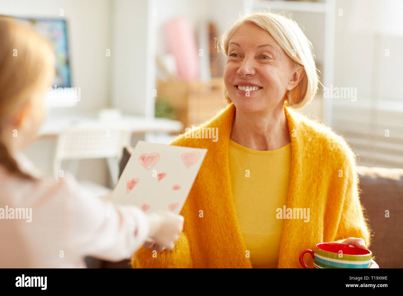 Happy Mother Receiving Card Stock Photo - Alamy