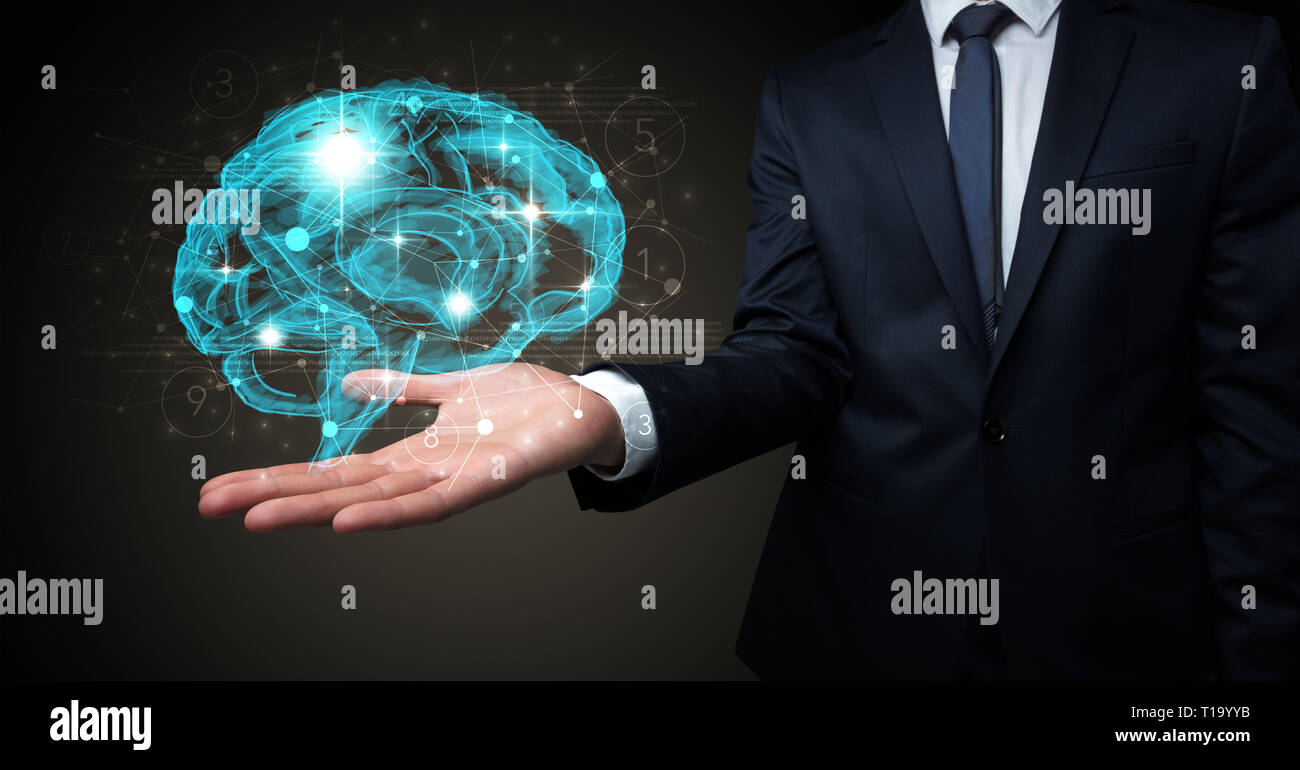 Businessman holding human brain on his hand with logistics symbols ...