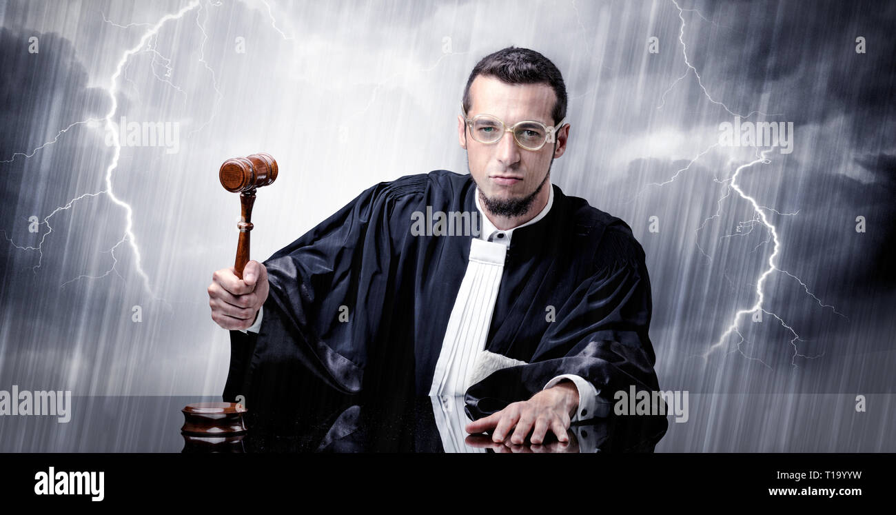 Young handsome judge with stormy wallpaper Stock Photo - Alamy