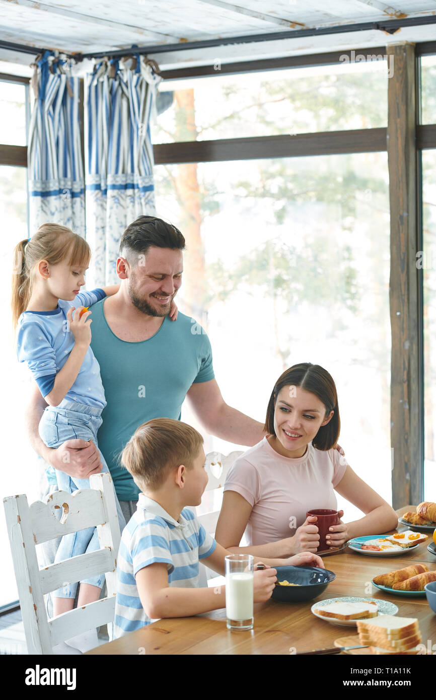 Young happy family having breakfast hi-res stock photography and images ...