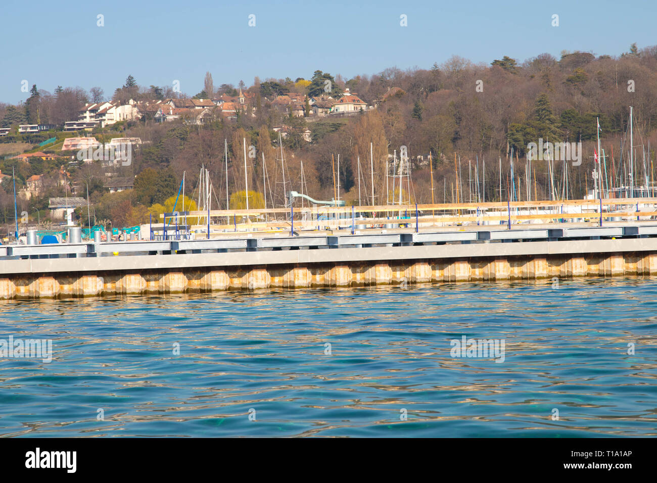 Geneva harbor construction site from the lake Stock Photo - Alamy
