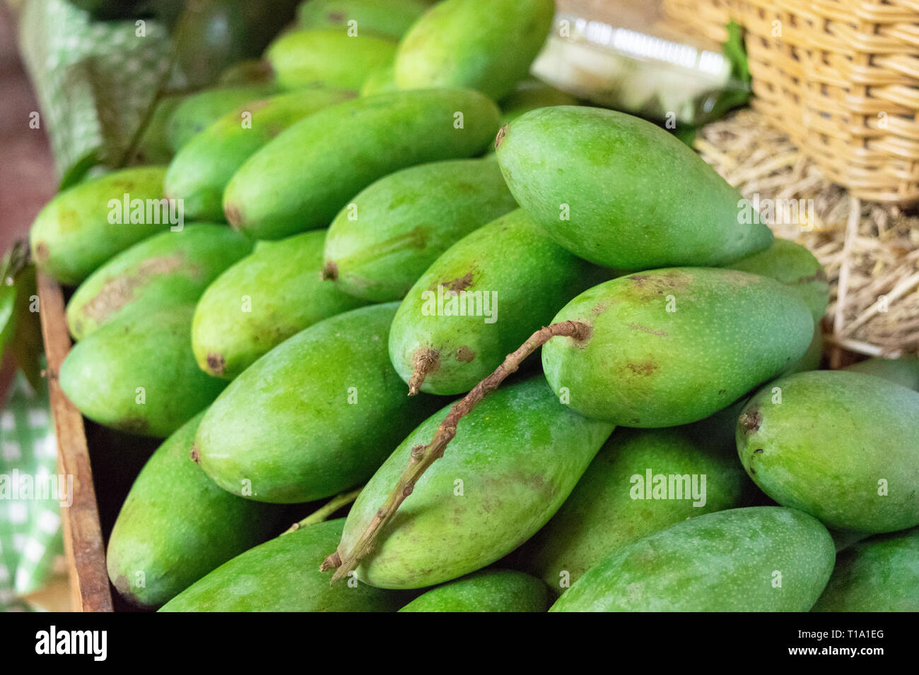 Mango in basket hi-res stock photography and images - Alamy