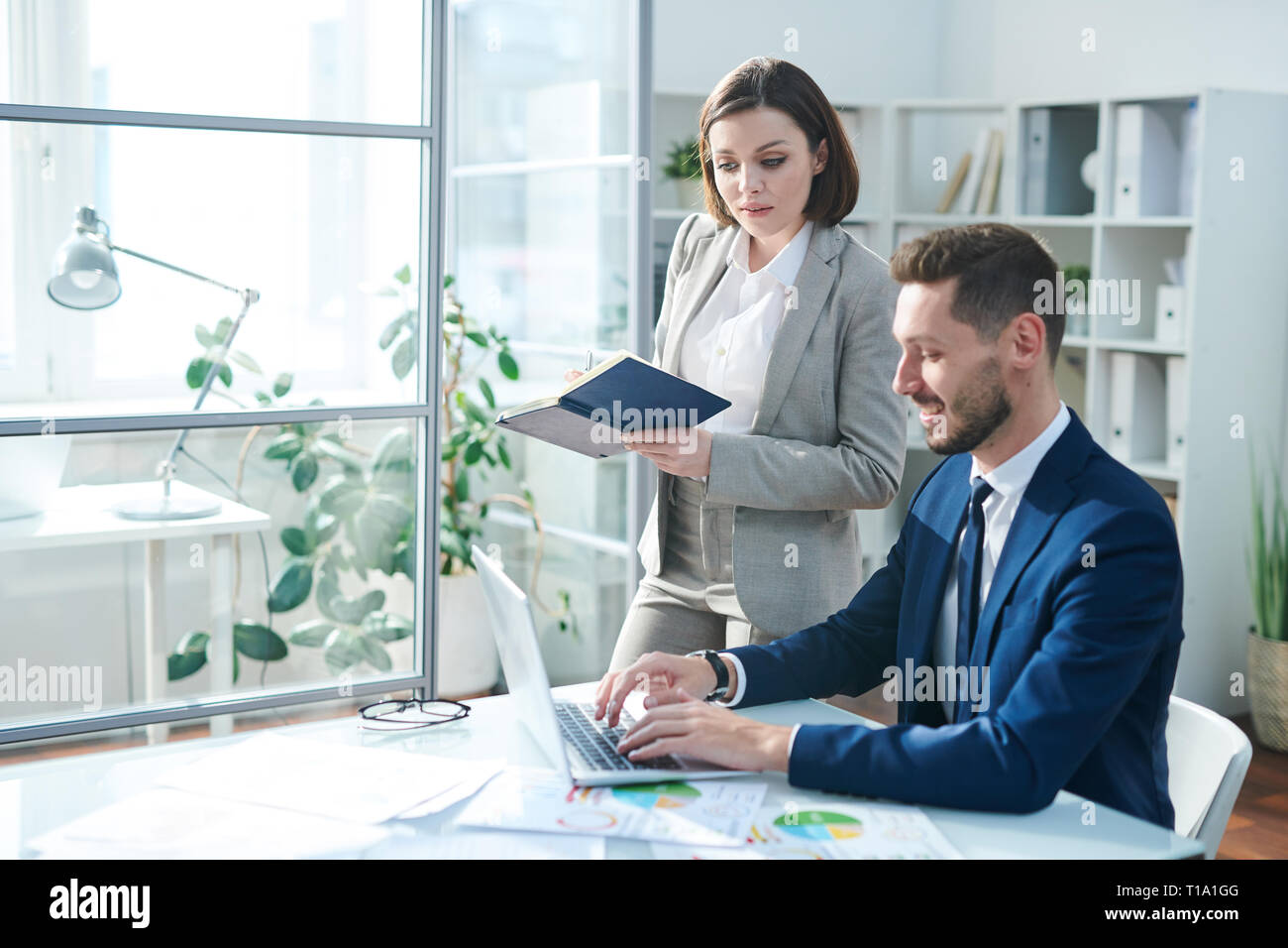 Secretary and boss Stock Photo - Alamy