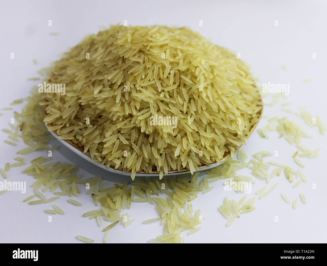 basmati rice on white background Stock Photo - Alamy