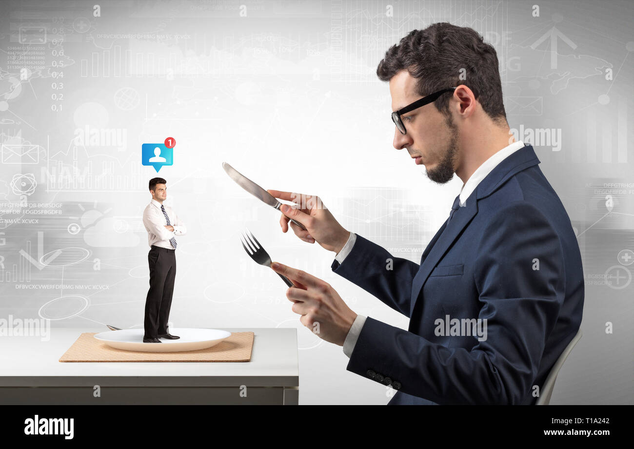 Giant businessman eating small man with financial background Stock ...