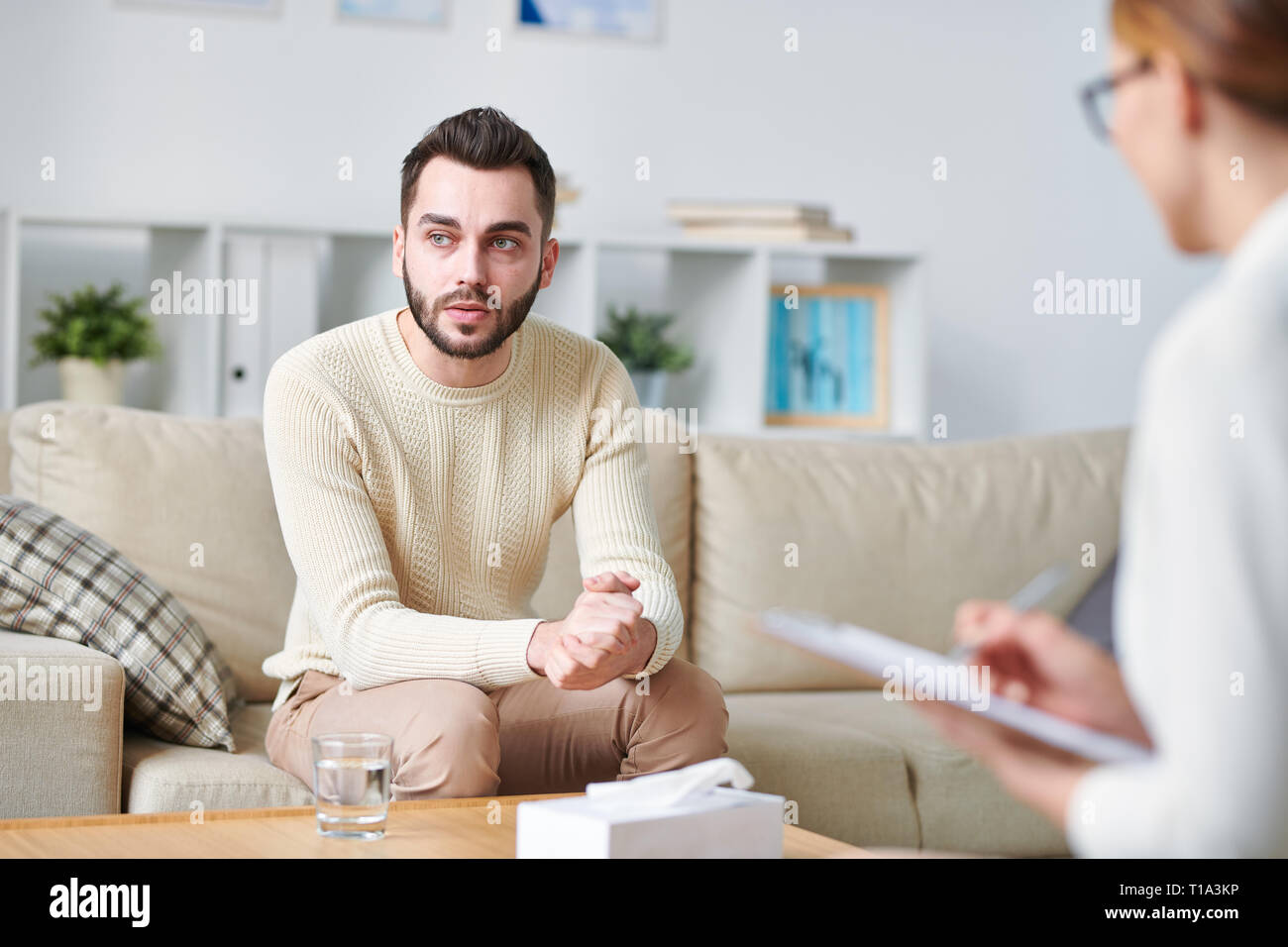 Businessman trying to help hi-res stock photography and images - Alamy