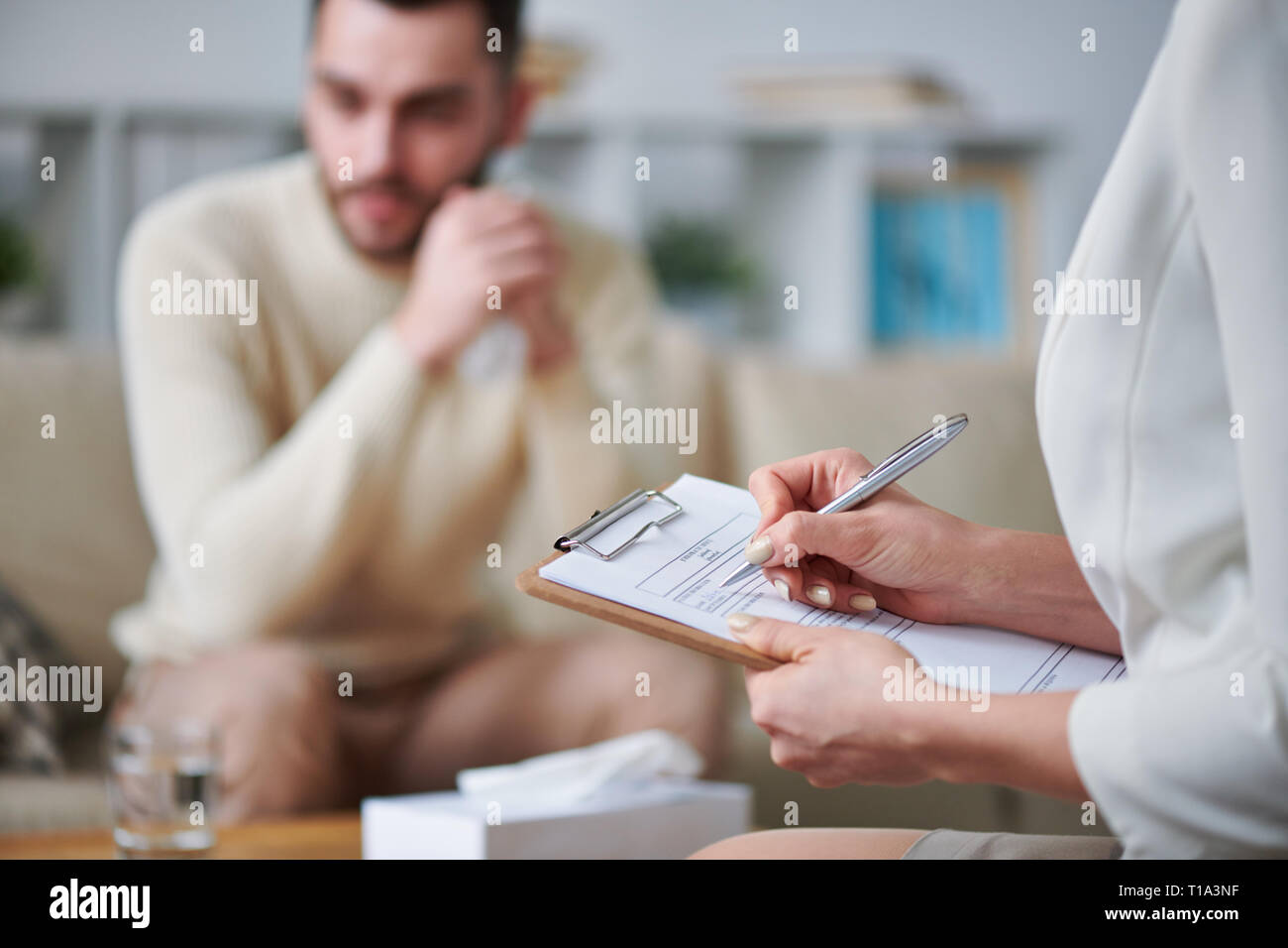 Making notes in document Stock Photo - Alamy