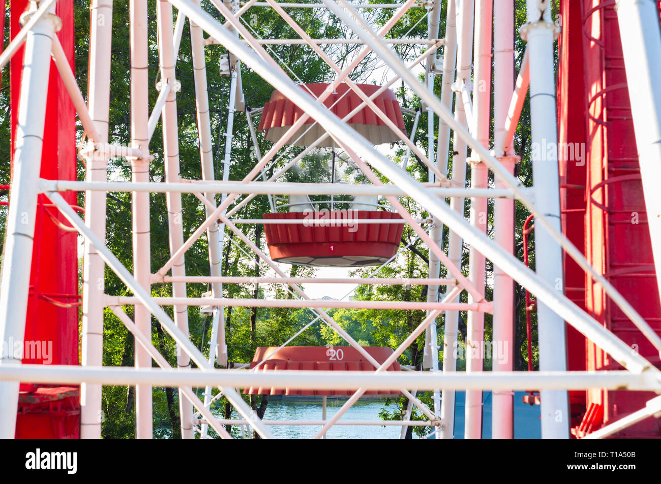 Attractions in spring city Park - Ferris Wheel Stock Photo - Alamy